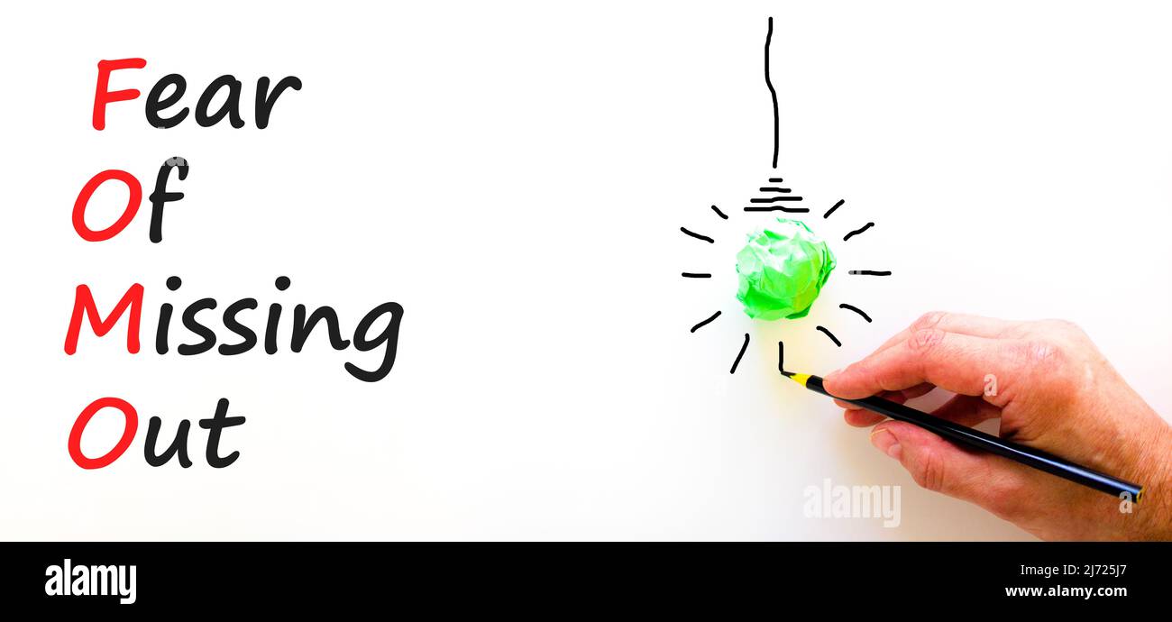 FOMO fear of missing out symbol. Concept words FOMO fear of missing out ...