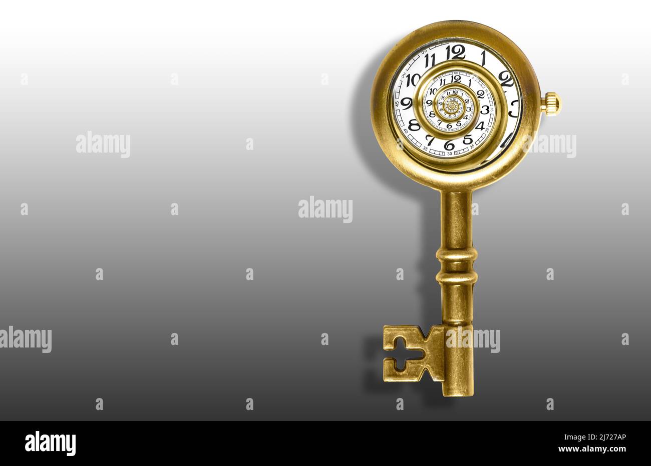 Watch built in a skeleton key having a swirled watch face isolated on a ...