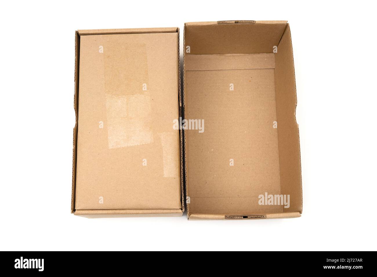 Open shipping box with one thousand business cards wrapped in a craft ...