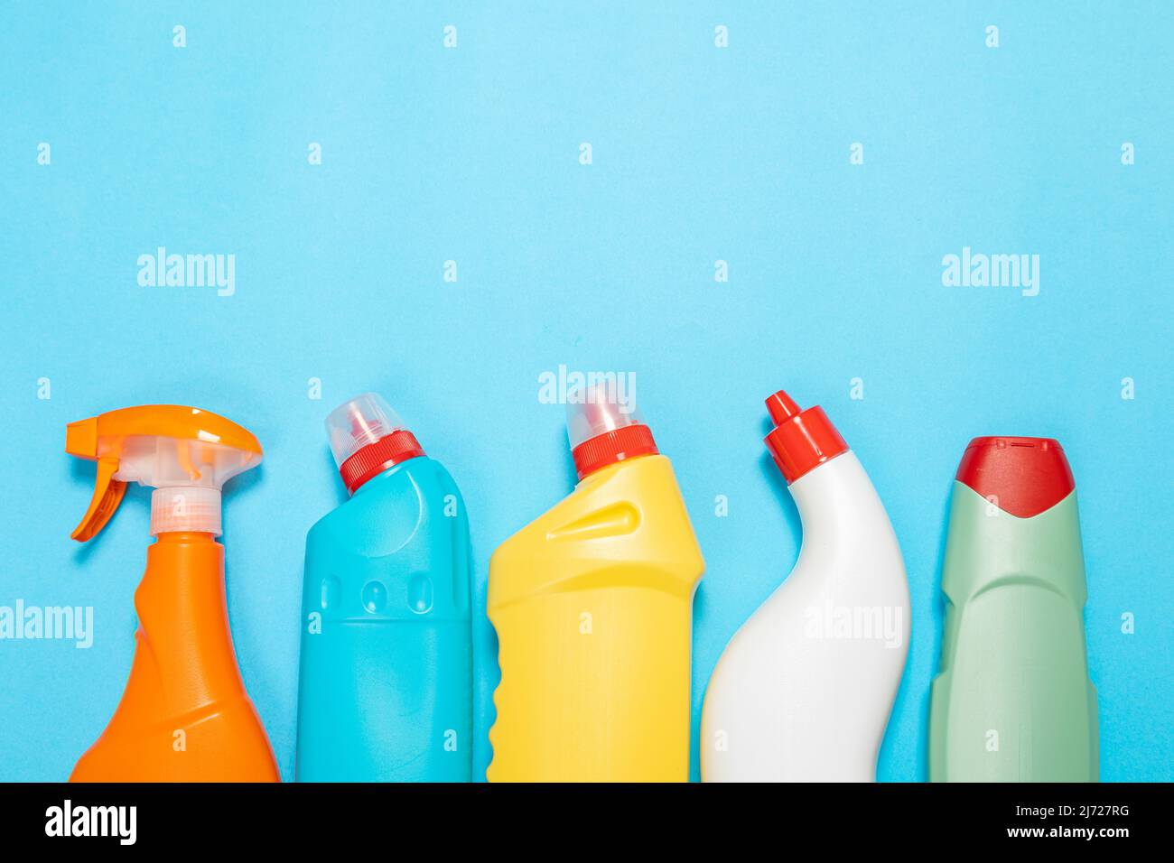 cleaning agent on a blue background on the side. Professional cleaning ...