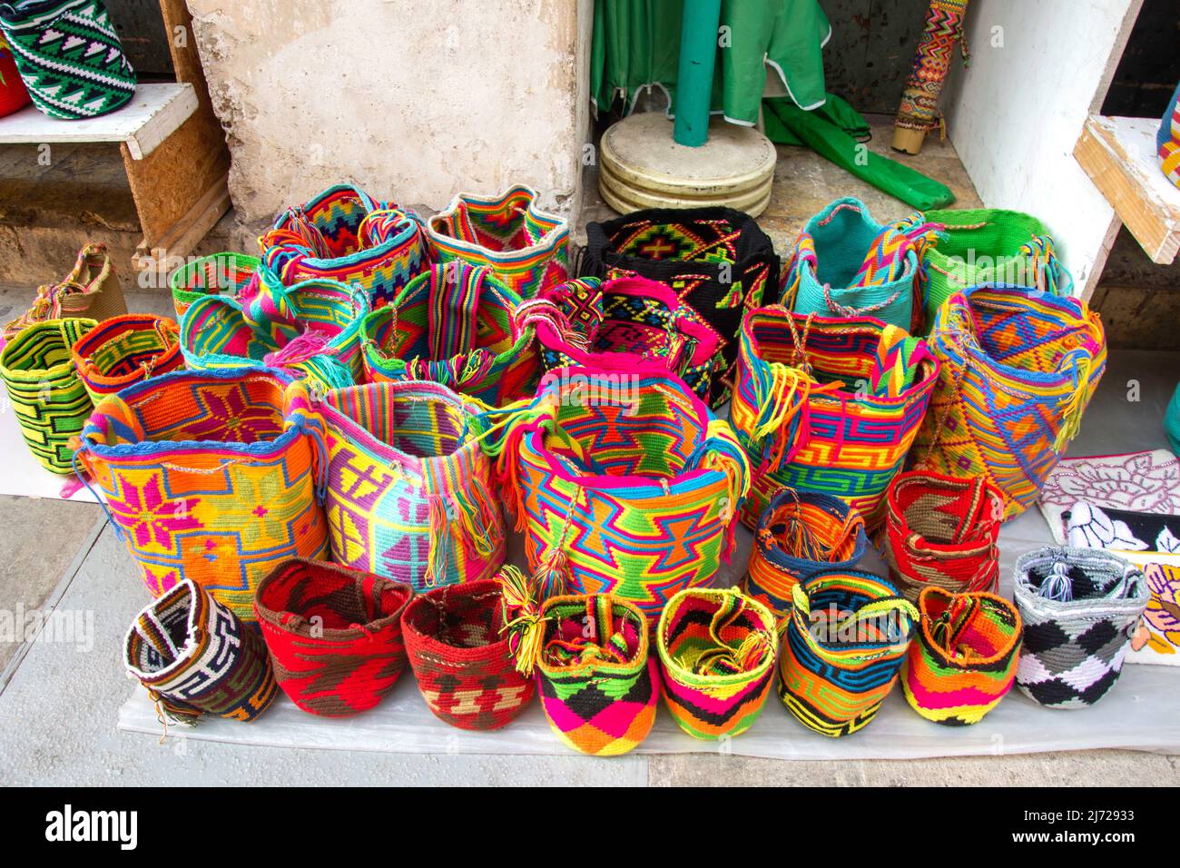 Colorful colourful woven bags baskets local crafts for sale hist hi-res ...