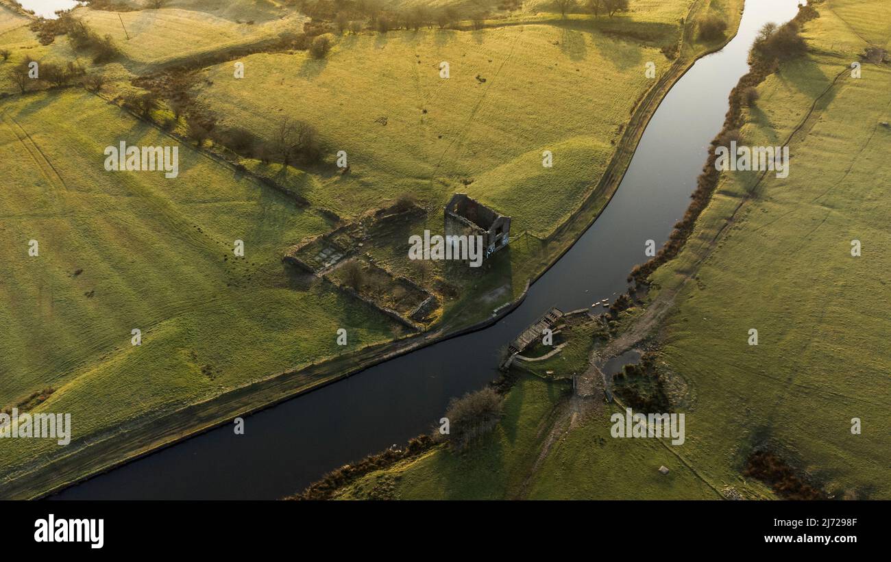 Aerial photograph of the old canal-side farm ruin of Lower Clough bank ...