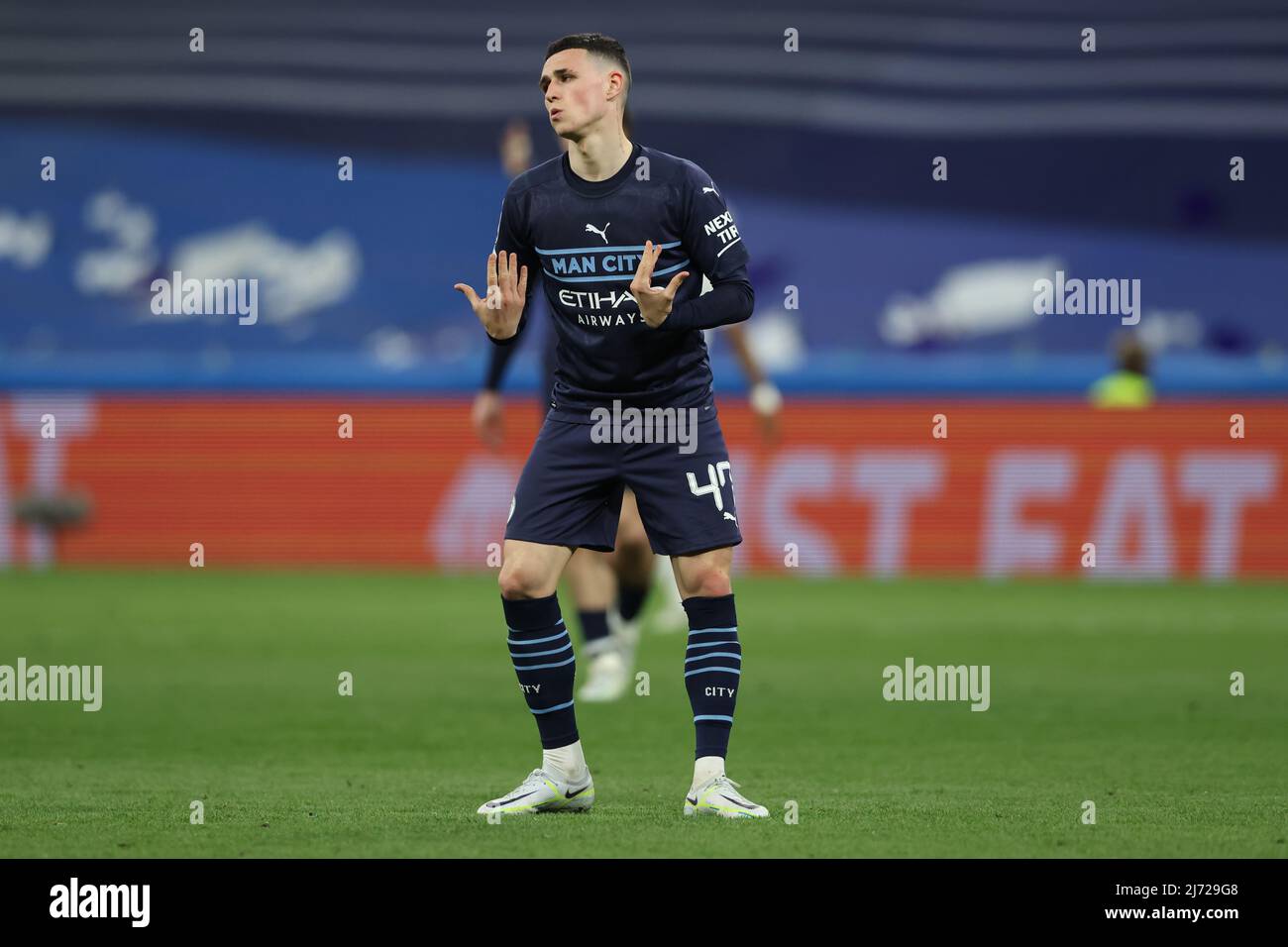 Madrid, Spain, 4th May 2022. Phil Foden of Manchester City reacts ...