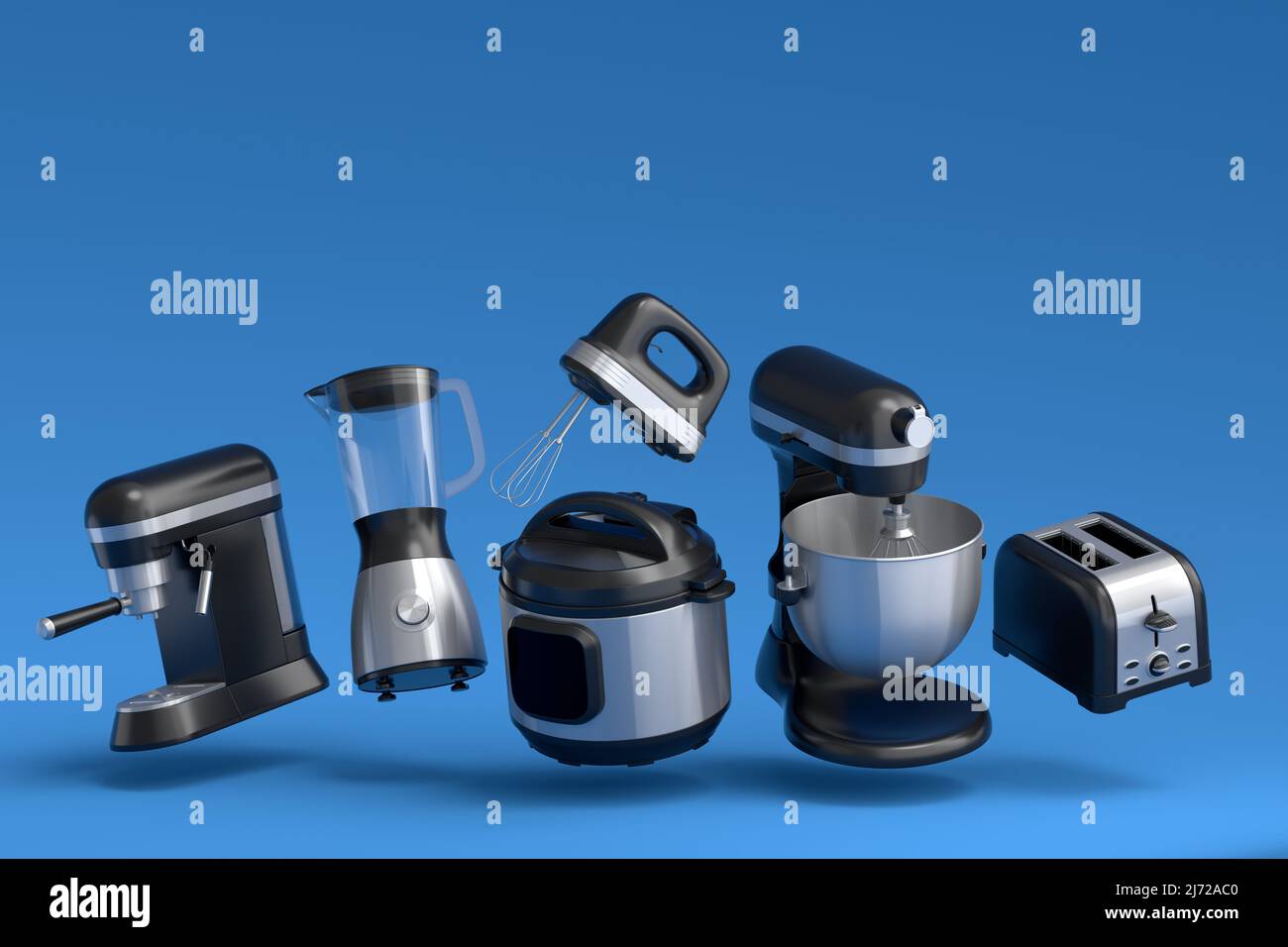 Electric kitchen appliances and utensils for making breakfast on blue ...