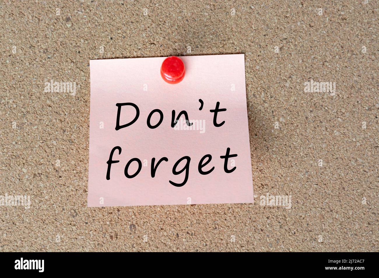 Sticky note with word don't forget. Reminder and appointment concept ...