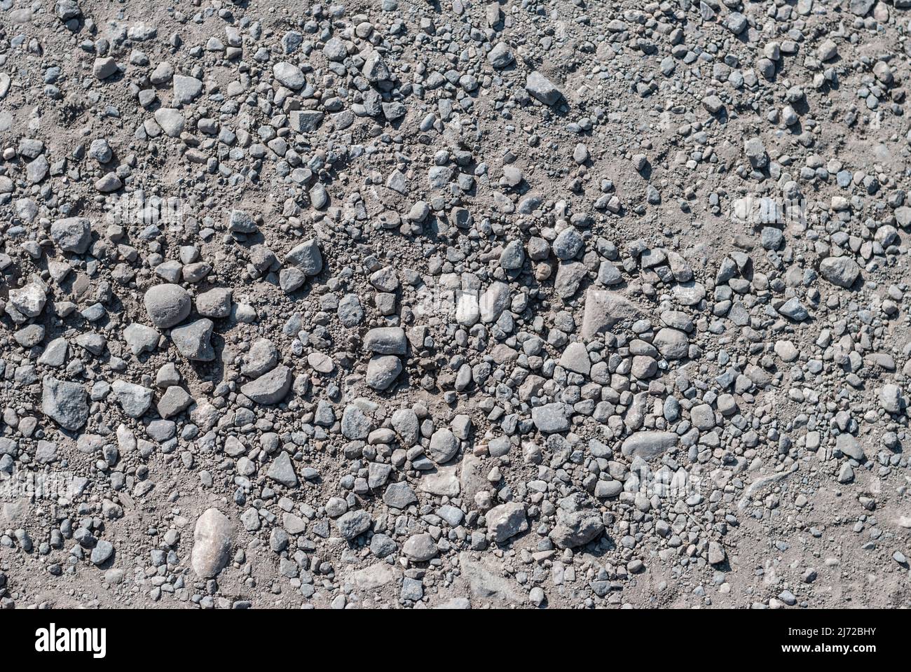 Dirt road with small stones background and texture concept Stock Photo ...