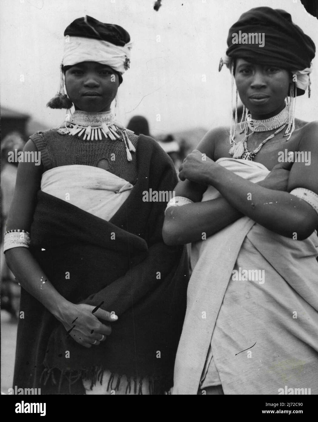 Two native girls dressed in their best finery took part in the welcome ...