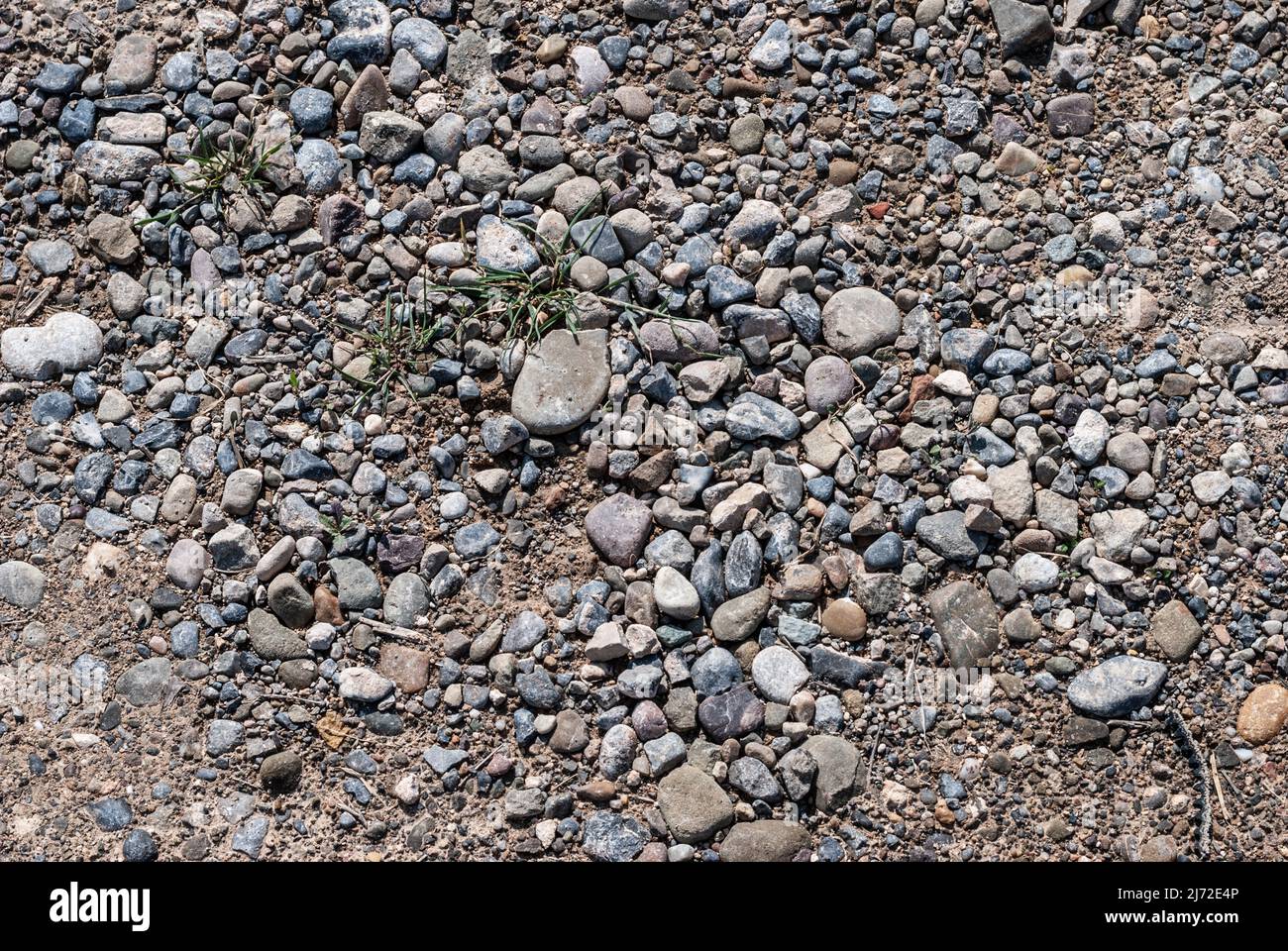 Dirt road with small stones background and texture concept Stock Photo ...