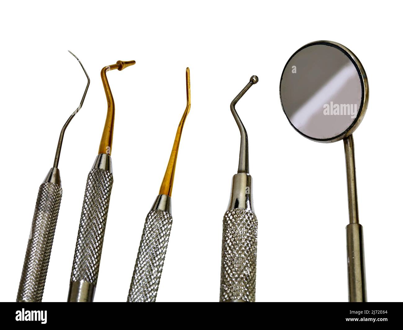 tools with a circular mirror on dental office on white background Stock ...