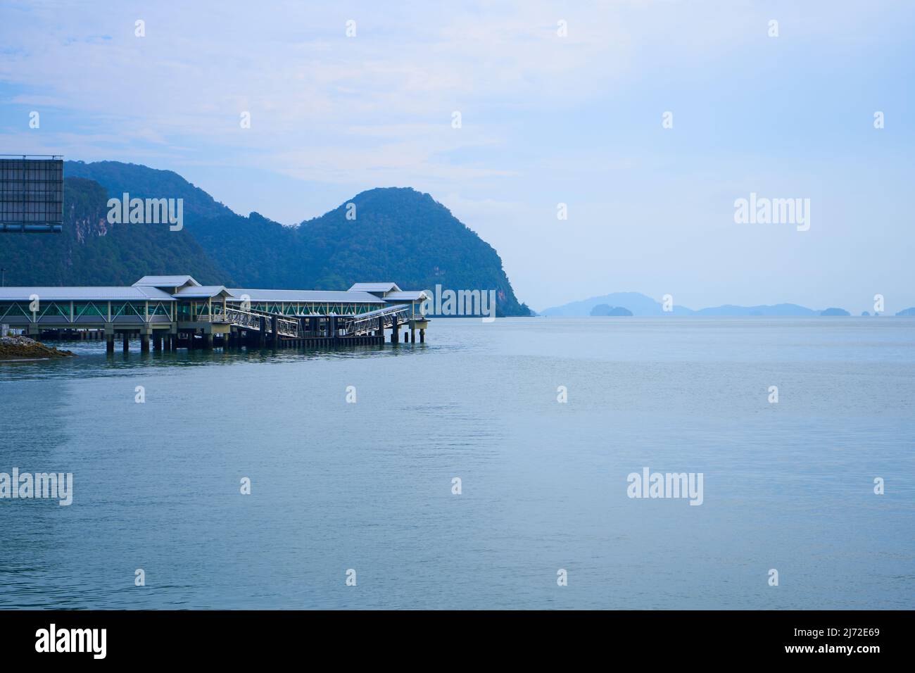 Covered boat pier. Transport boat port on a tropical island Stock Photo ...
