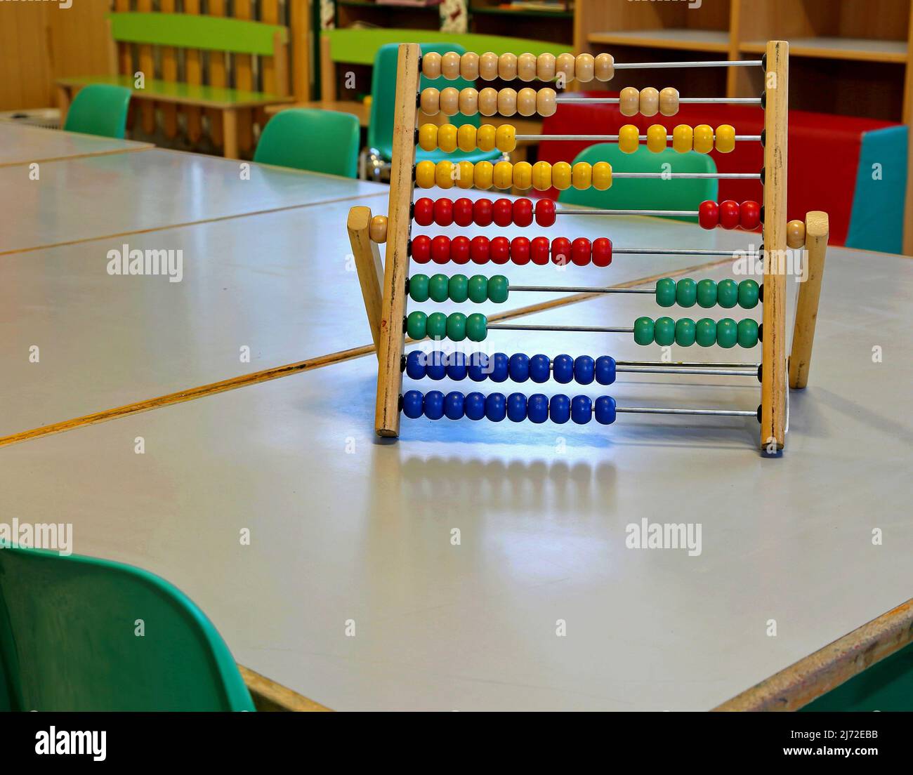 classroom of kindergarten and an old wooden abacus on the table Stock ...