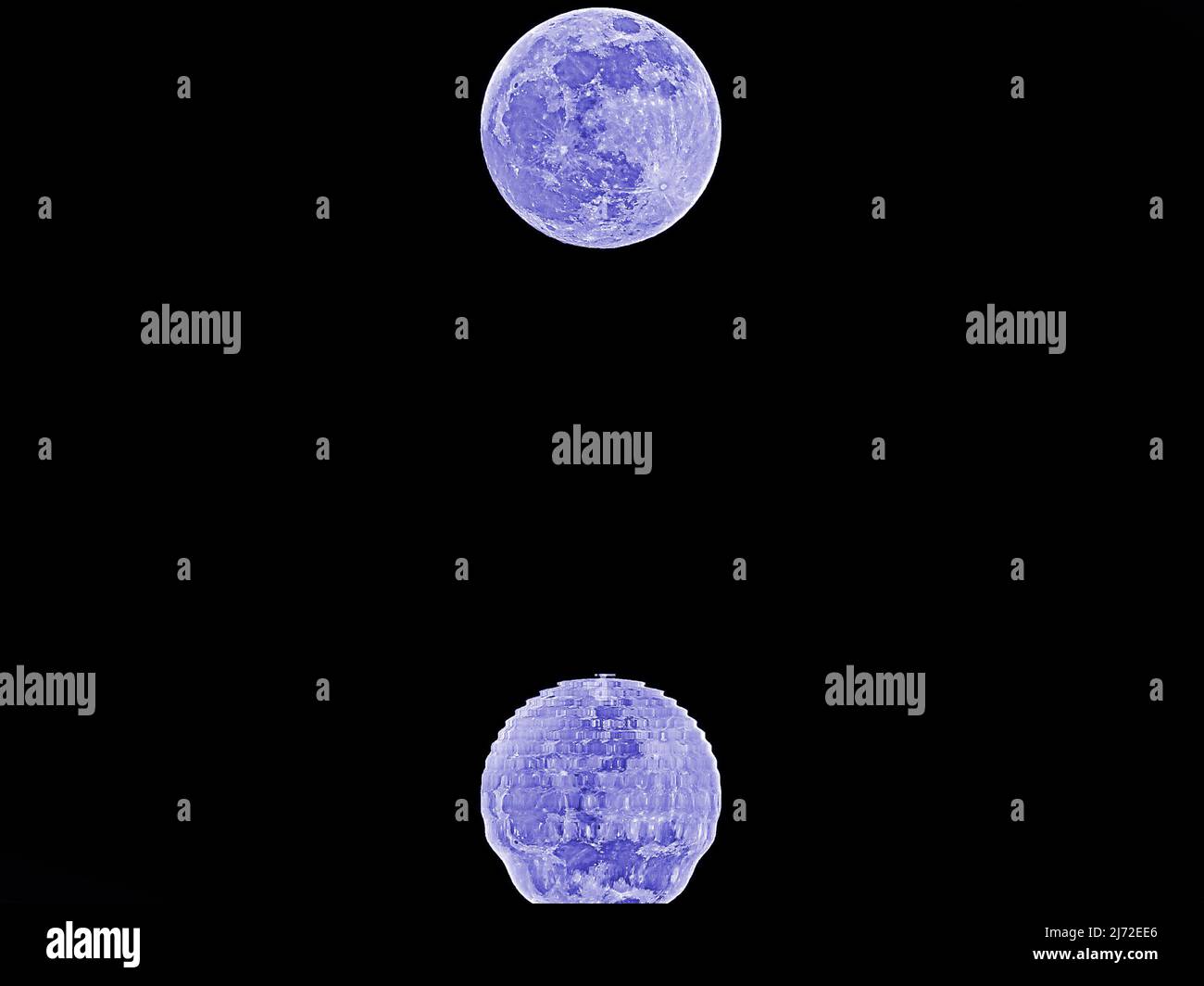 reflections on the sea of a BLUE full moon in the dark night Stock ...