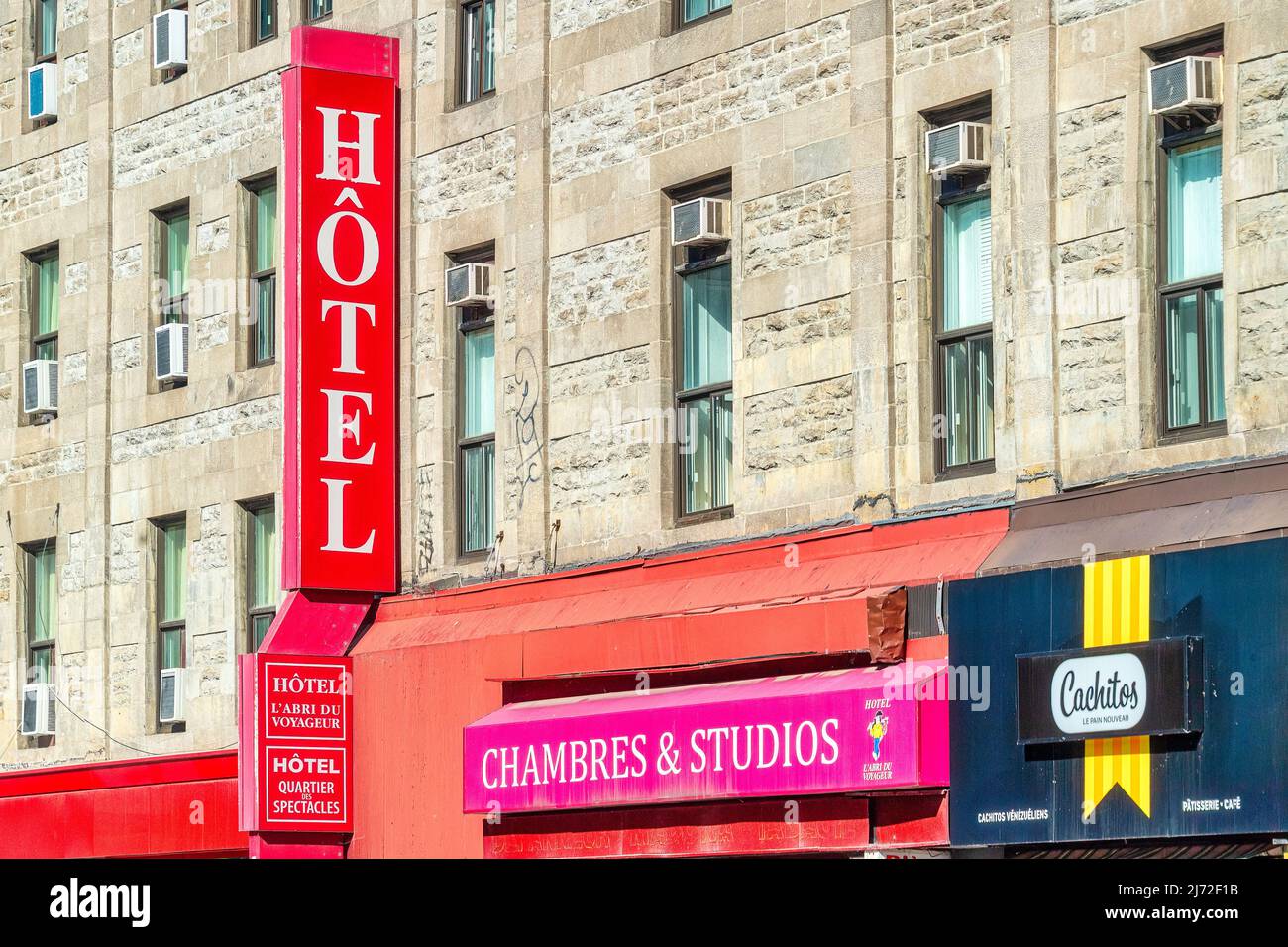Hotel sign in a colonial building. Old Montreal is a Unesco World ...