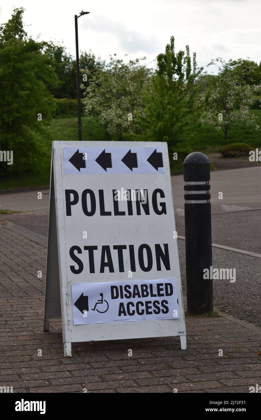 Sign outside a polling station, showing the way in and disabled access ...