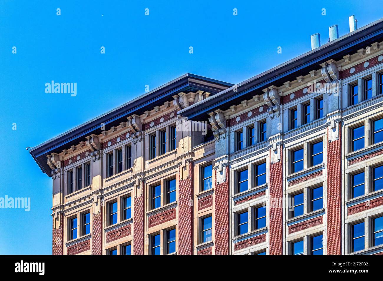 Windows in exterior wall. Architectural feature of an old building in ...