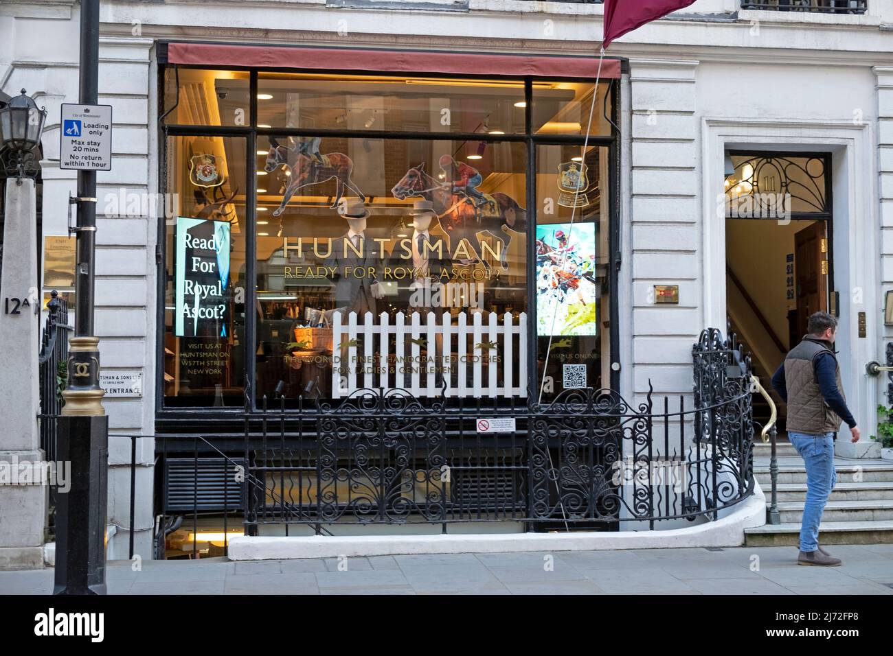 Exterior view of bespoke tailoring shop window display at Huntsman ...