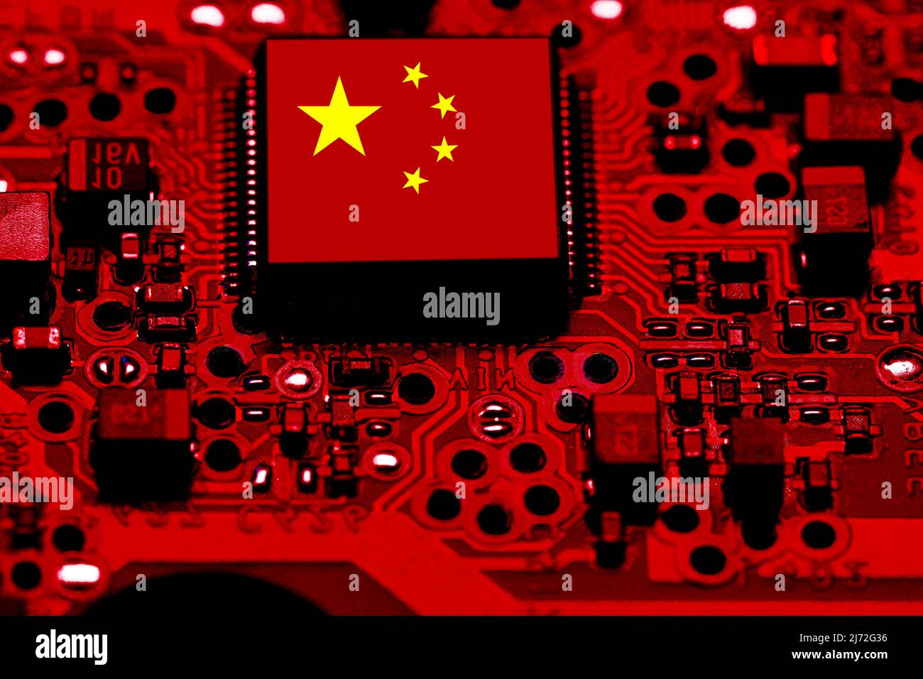 Chinese National Flag overlaid on PC micro chip on integrated circuit ...