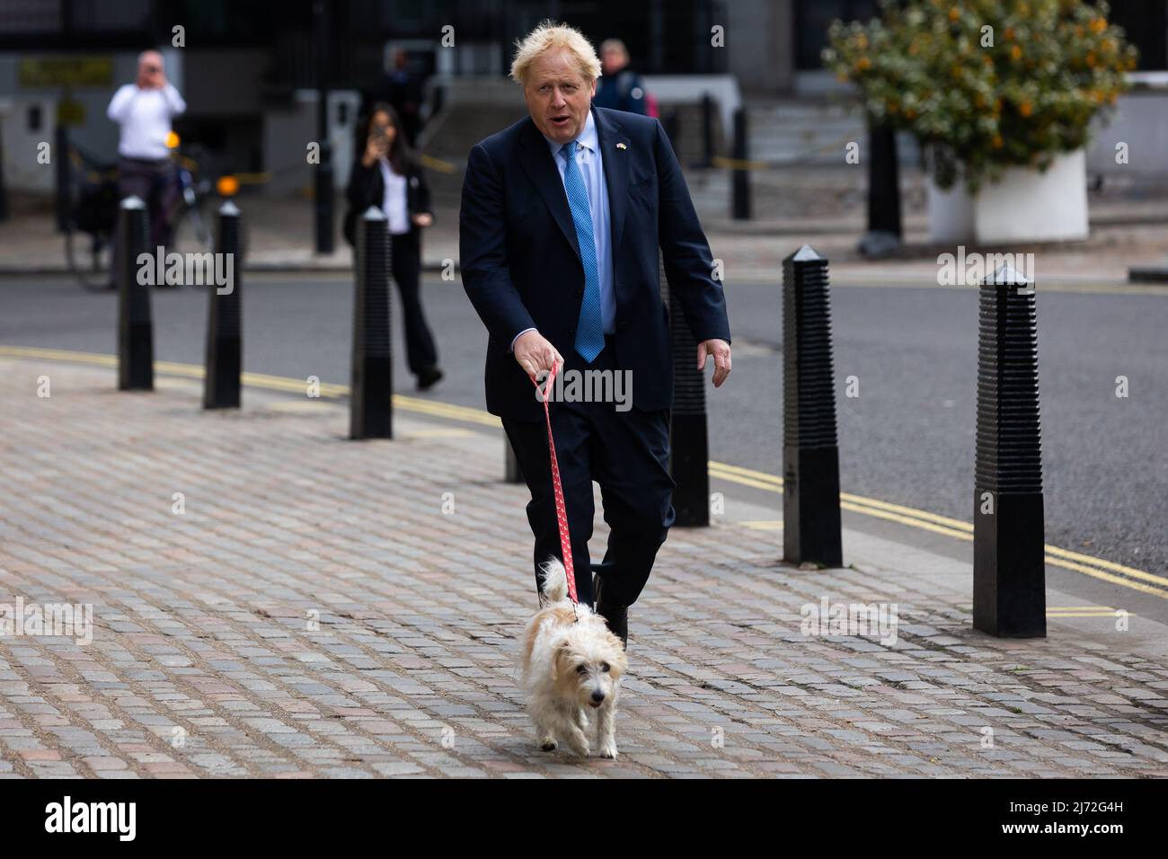 Prime Minister Boris Johnson with dog Dilyn casts his vote in the 2022 ...