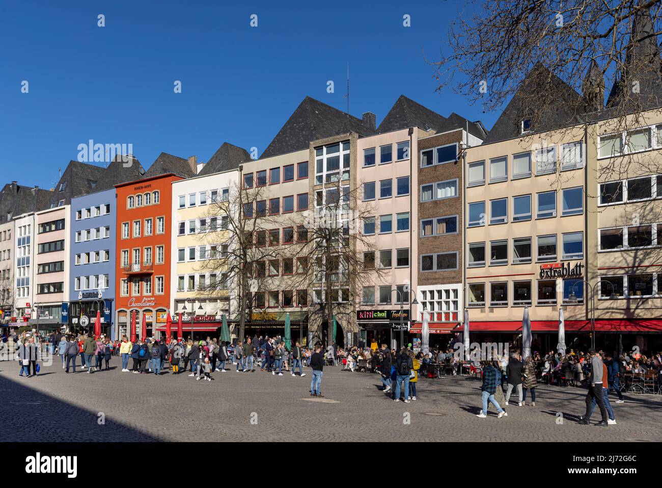Tourists enjoying free time in Cologne old town Stock Photo - Alamy