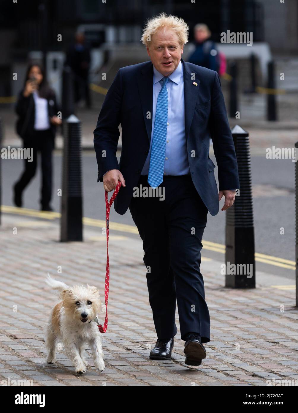 Prime Minister Boris Johnson with dog Dilyn casts his vote in the 2022 ...