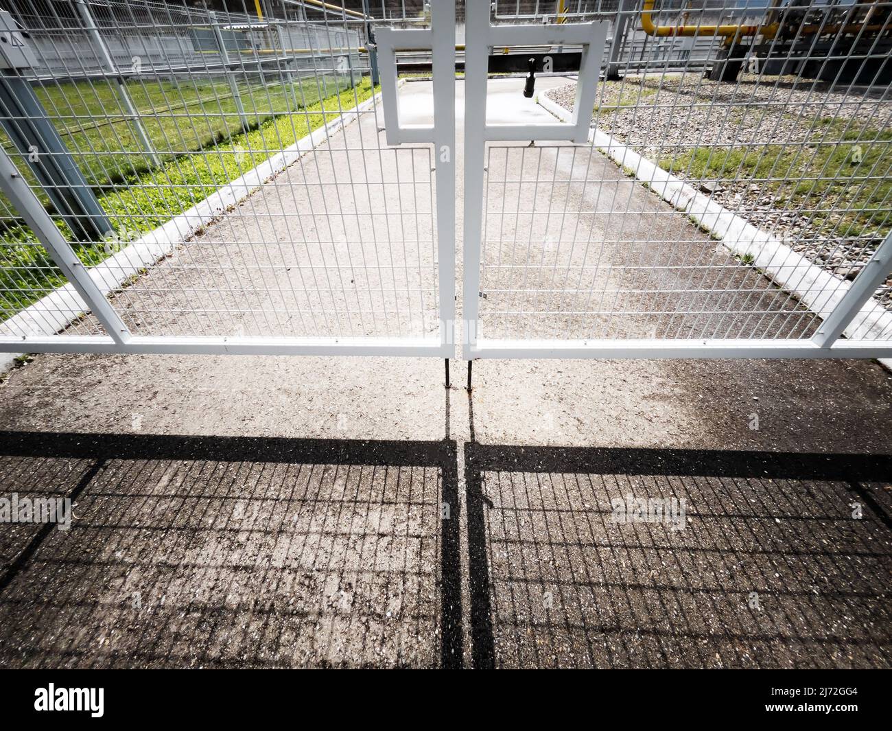 Shadow of iron gate on wall hi-res stock photography and images - Alamy