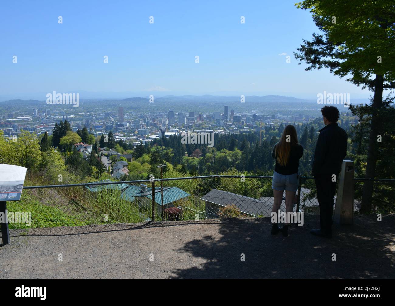 Visitors at the viewpoint in the grounds of the historic Pittock ...