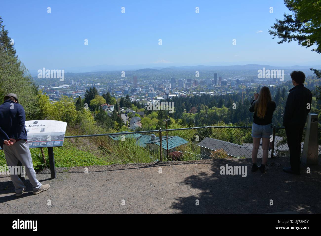 Visitors at the viewpoint in the grounds of the historic Pittock ...