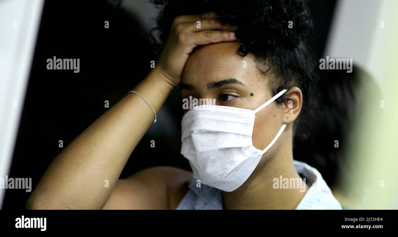 Tired black girl commuting to work riding subway Stock Photo - Alamy