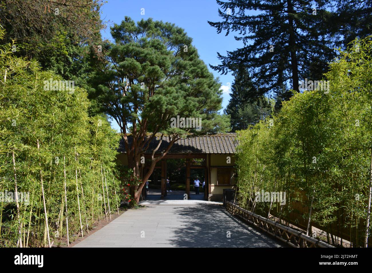 A traditional style gate entrance and walkway at the Portland Japanese ...