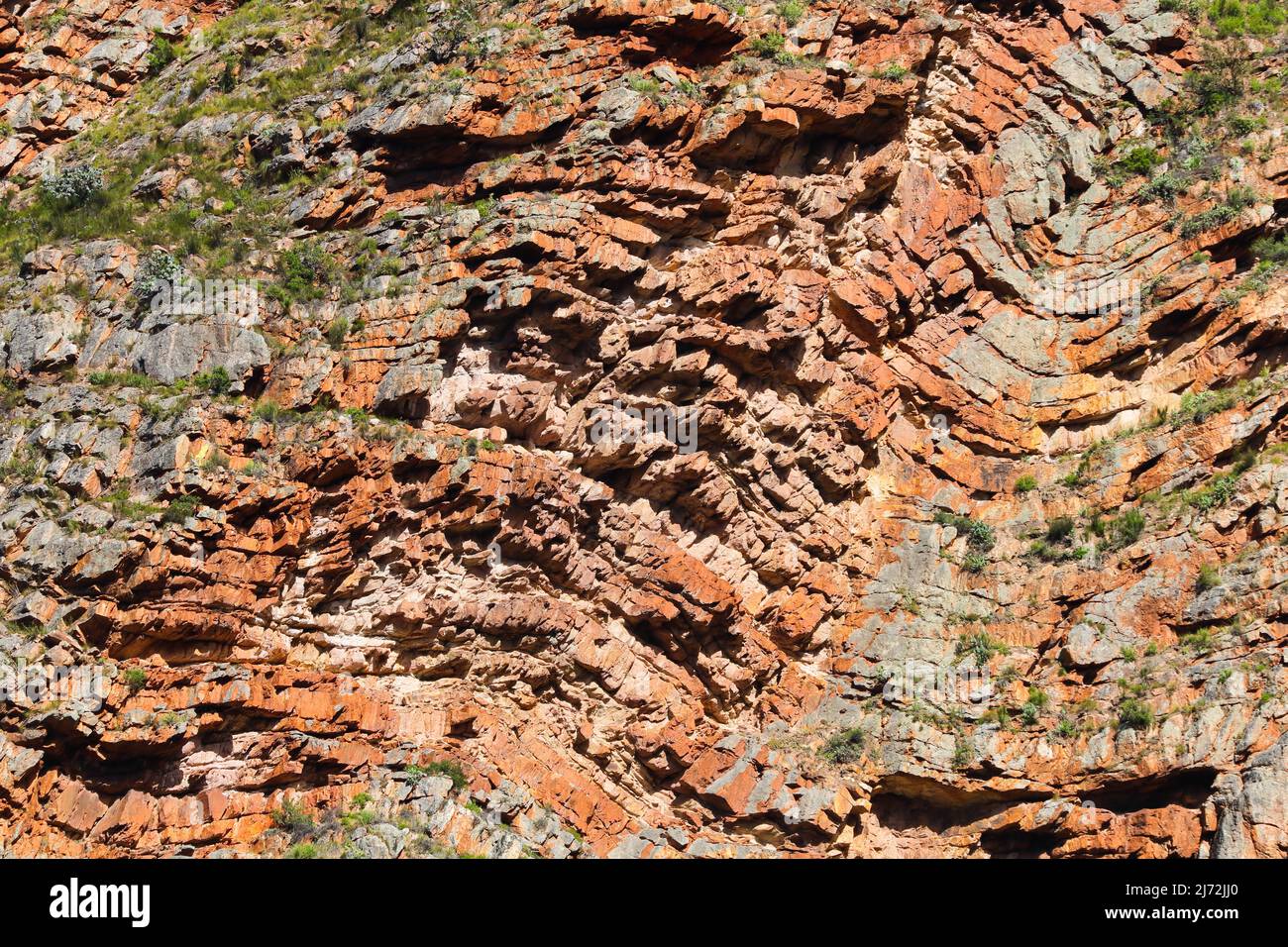 Natural Flowing Cliff Rock Face Strata Lines Stock Photo - Alamy