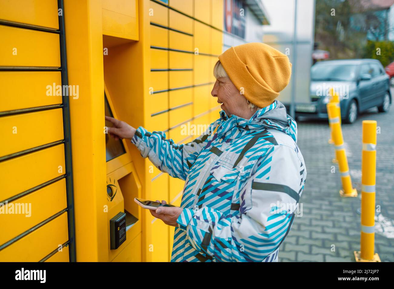 50s 60s Caucasian woman send or receive parcel with self service post ...