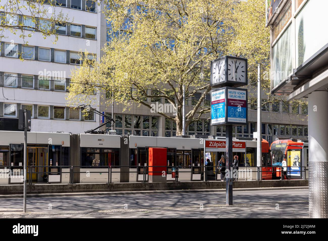Cologne downtown with tourists walking on streets in a bright spring ...