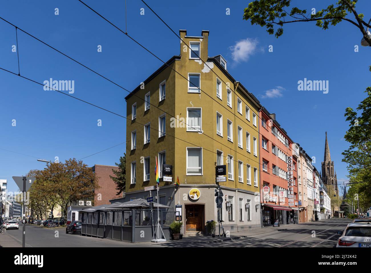 Cologne downtown with tourists walking on streets in a bright spring ...