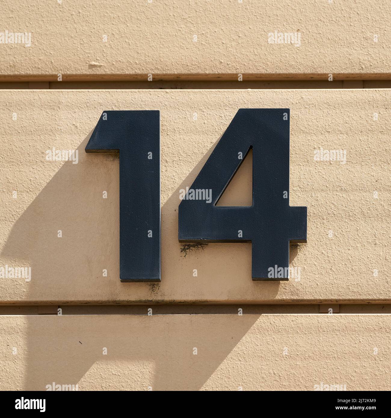 House number 14 on the facade of a house in Magdeburg in Germany Stock ...