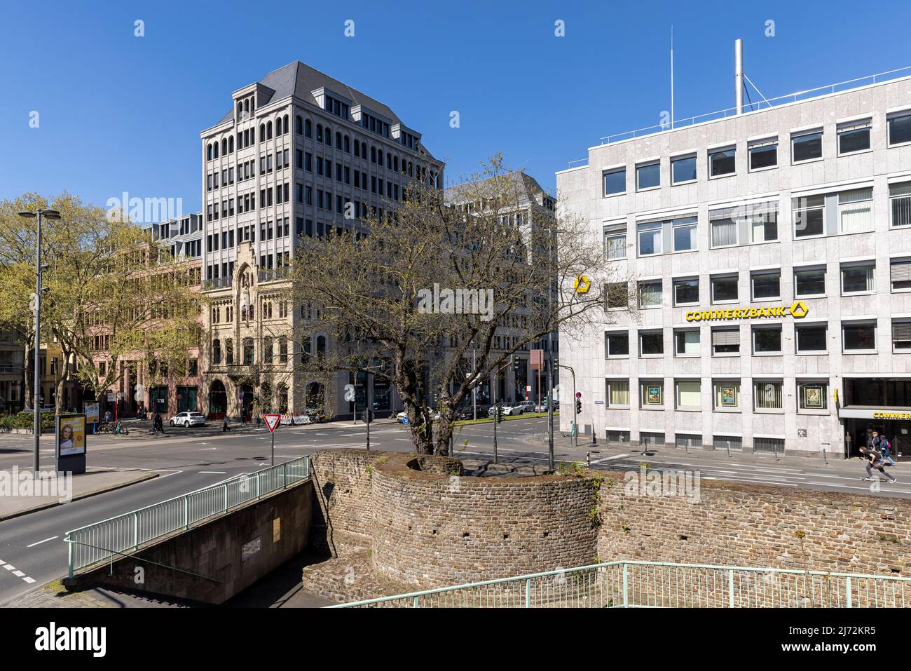 Cologne downtown with tourists walking on streets in a bright spring ...