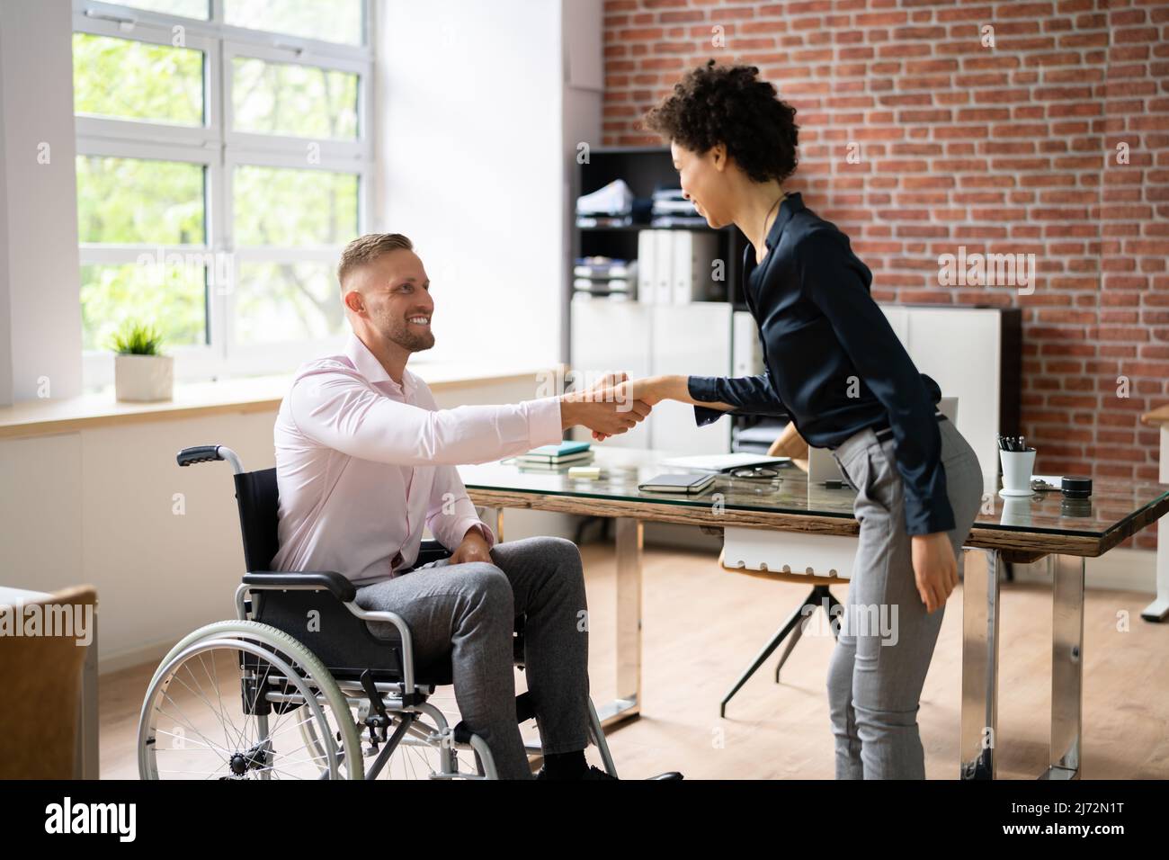 Disability access in offices hi-res stock photography and images - Alamy