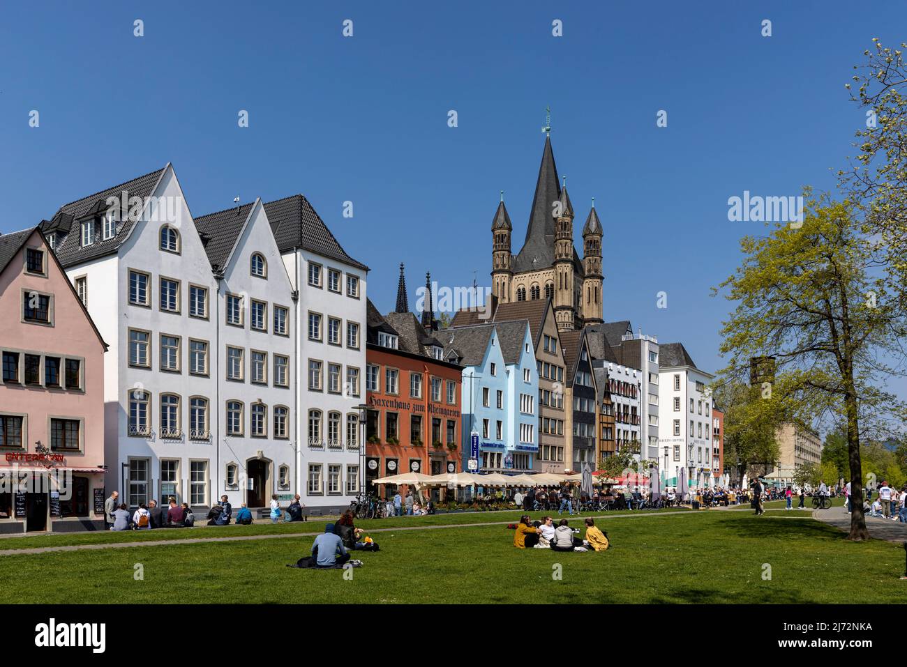 Tourists enjoying free time in Cologne old town Stock Photo - Alamy
