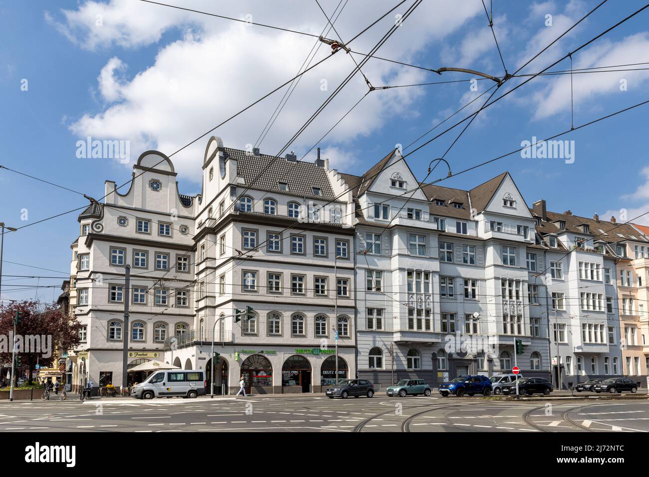Cologne downtown with tourists walking on streets in a bright spring ...