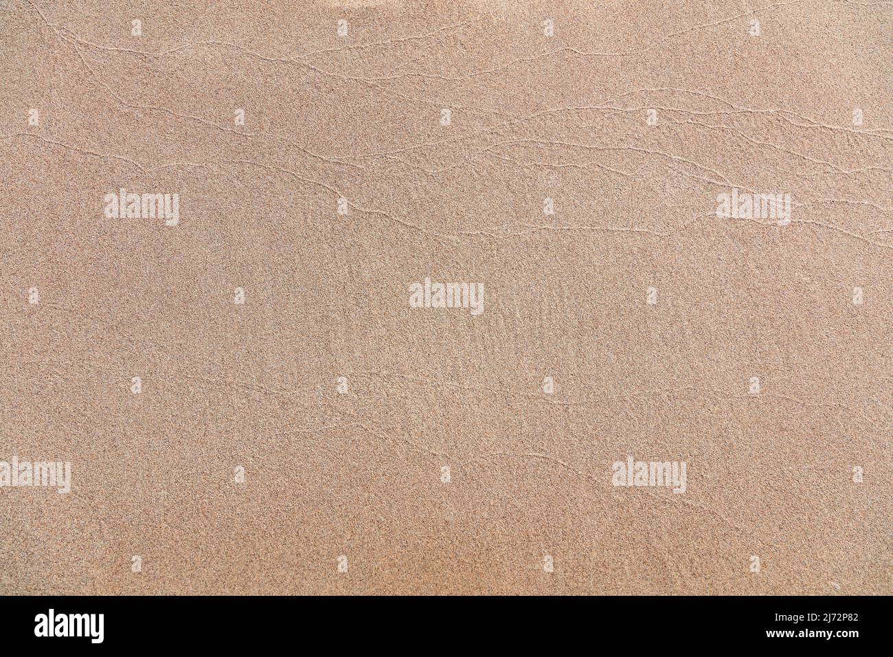 Empty wet sand texture background. Sandy beach in Greece, close up top ...