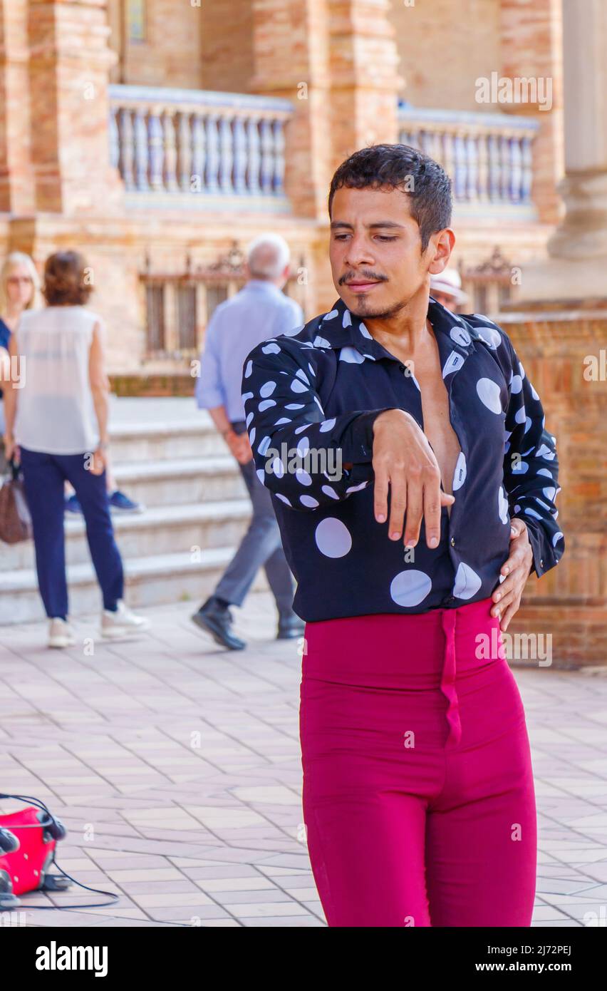 hispanic male flamenco dancer performing to tourists at the Plaza de ...