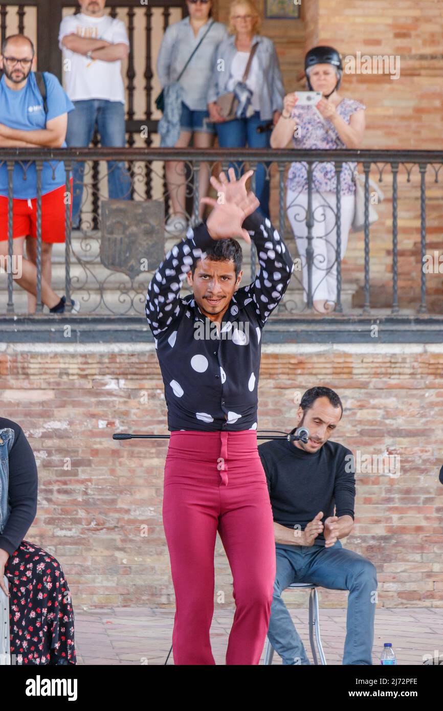 hispanic male flamenco dancer performing to tourists at the Plaza de ...