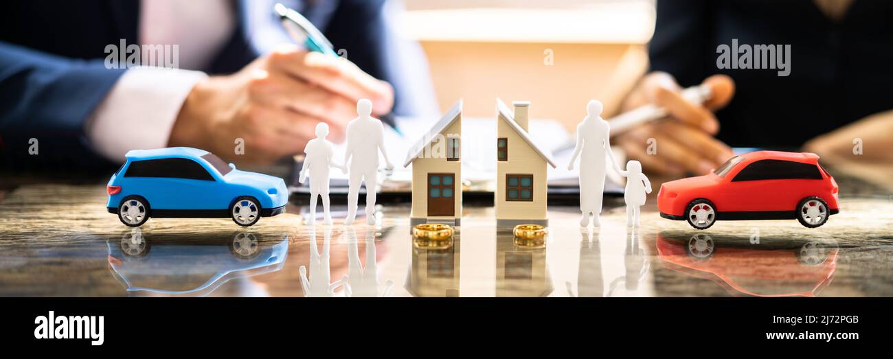 Wife And Husband Splitting Children And House During Divorce Process ...