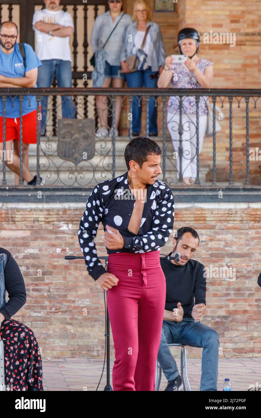hispanic male flamenco dancer performing to tourists at the Plaza de ...