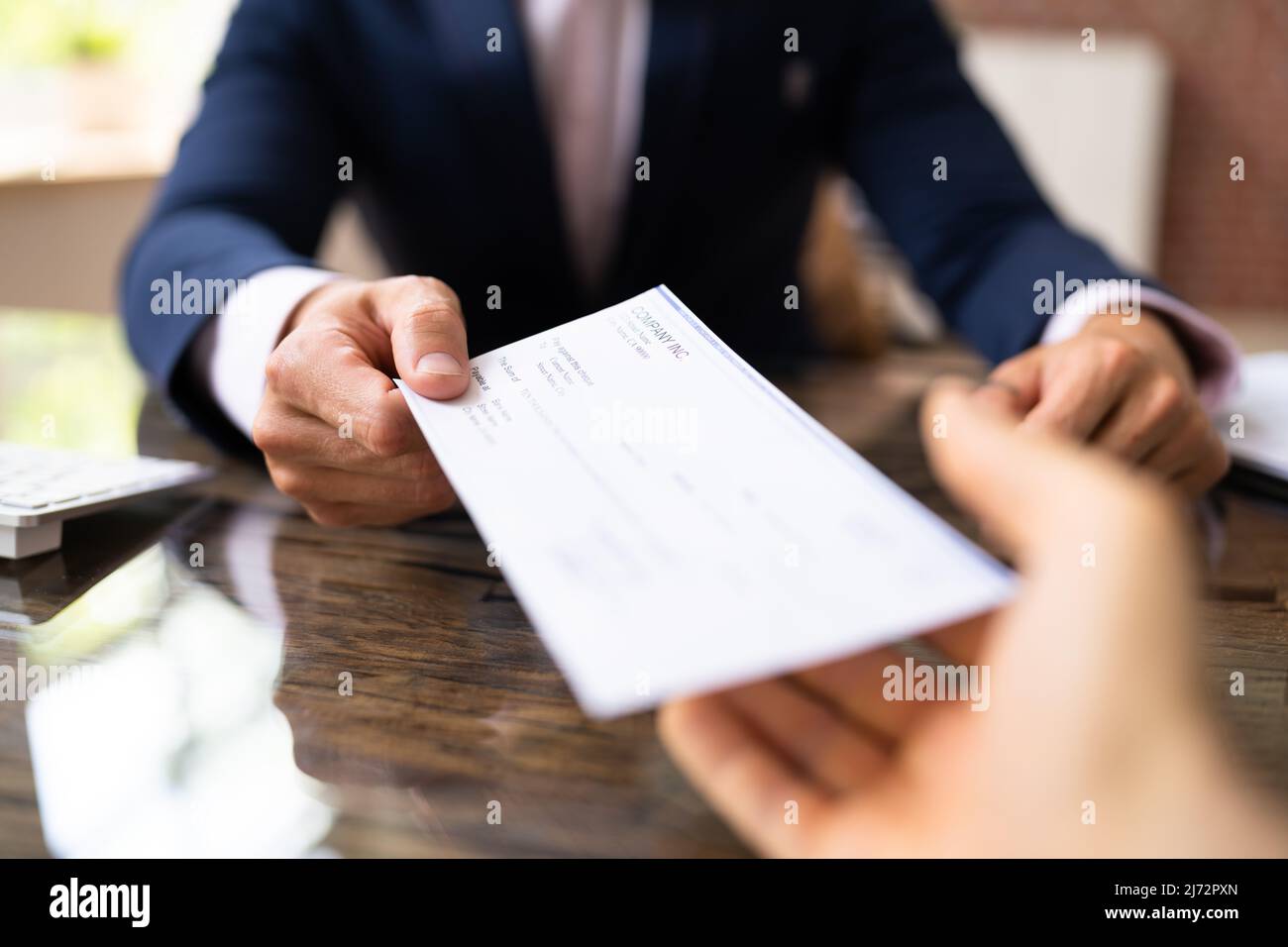 Hand Giving Payroll Compensation Paycheck. Salary Cheque Stock Photo ...