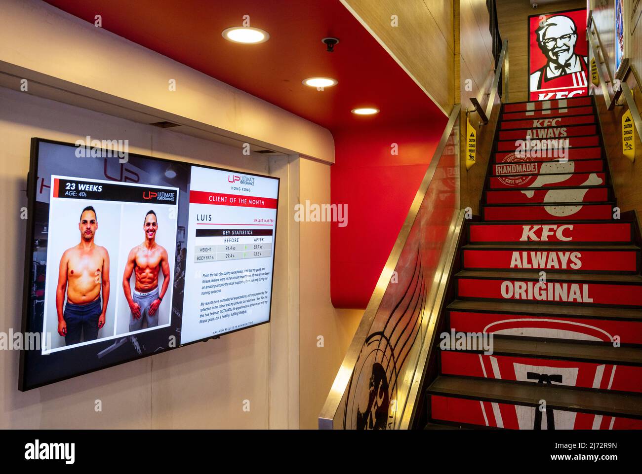 A gym shares an entrance building with the American fast food chicken ...
