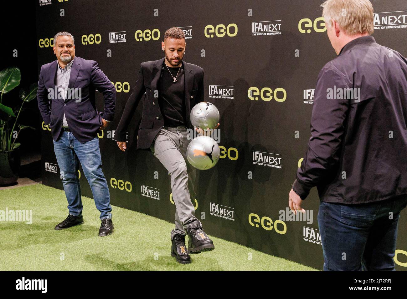 05 May 2022, Berlin: Footballer Neymar Jr. (m) juggling a soccer ball ...
