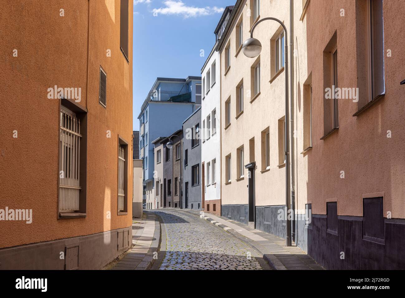 Cologne downtown with tourists walking on streets in a bright spring ...