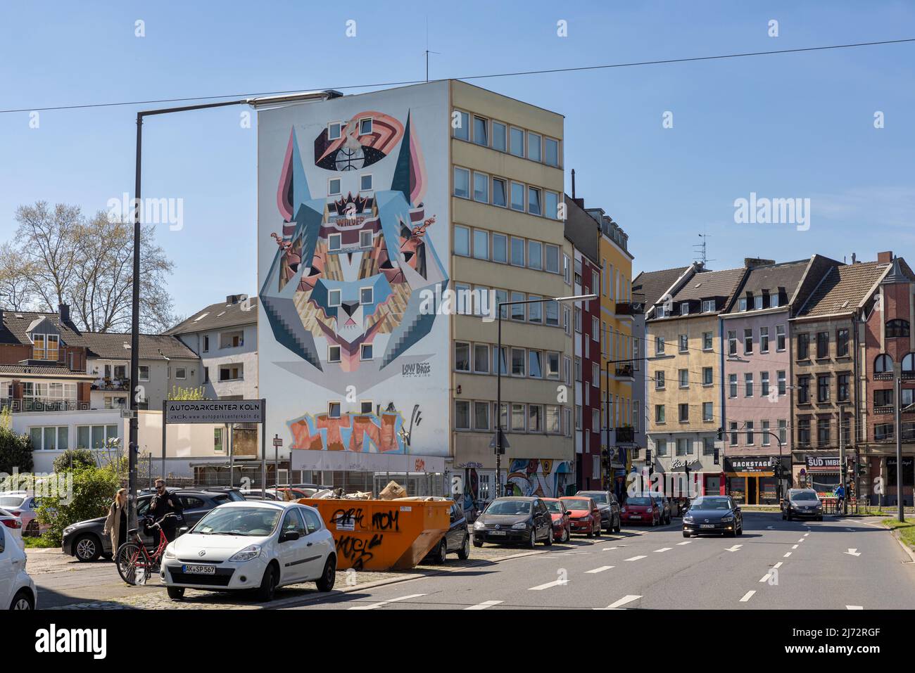 Cologne downtown with tourists walking on streets in a bright spring ...