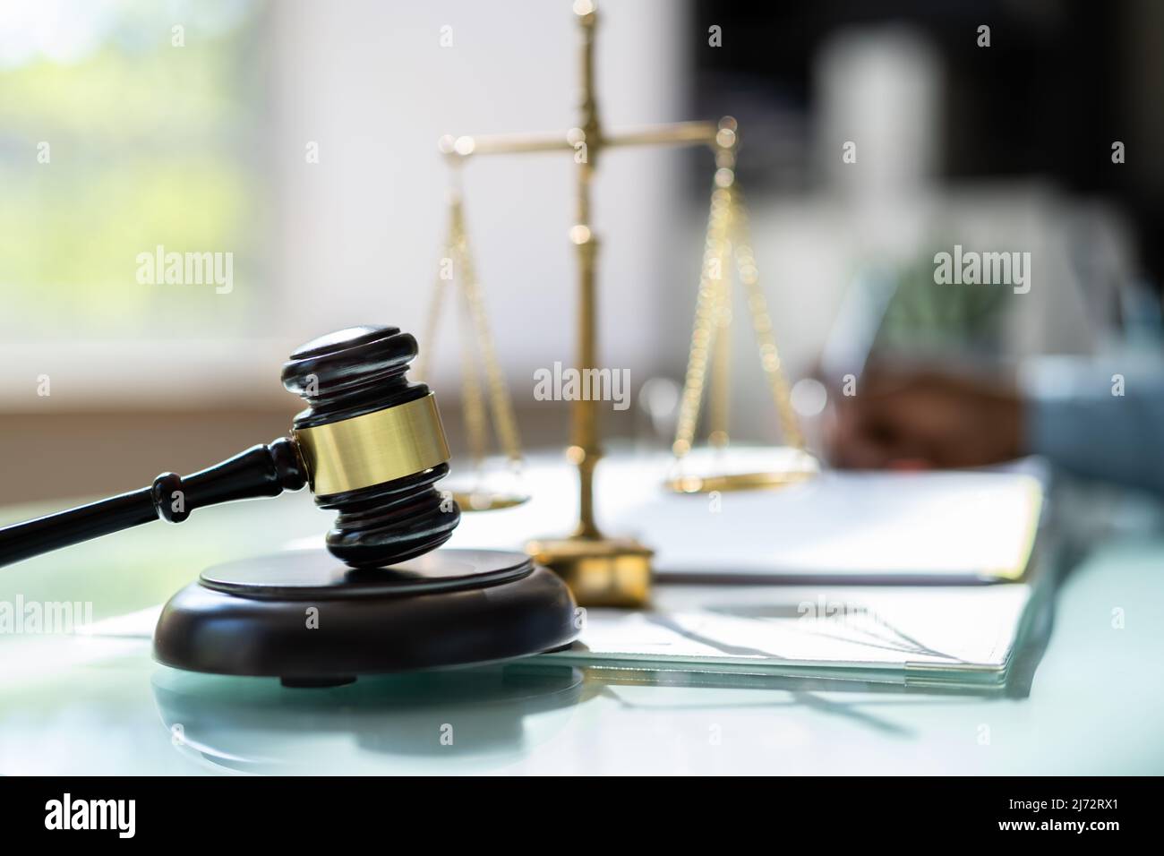 Judge With Gavel And Law Scale At Court Stock Photo - Alamy
