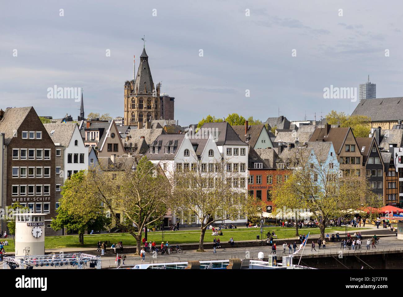 Tourists enjoying free time in Cologne old town Stock Photo - Alamy